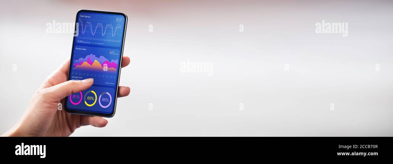 Mobile Phone And Smartphone Analytics Graph KPI Stock Photo - Alamy