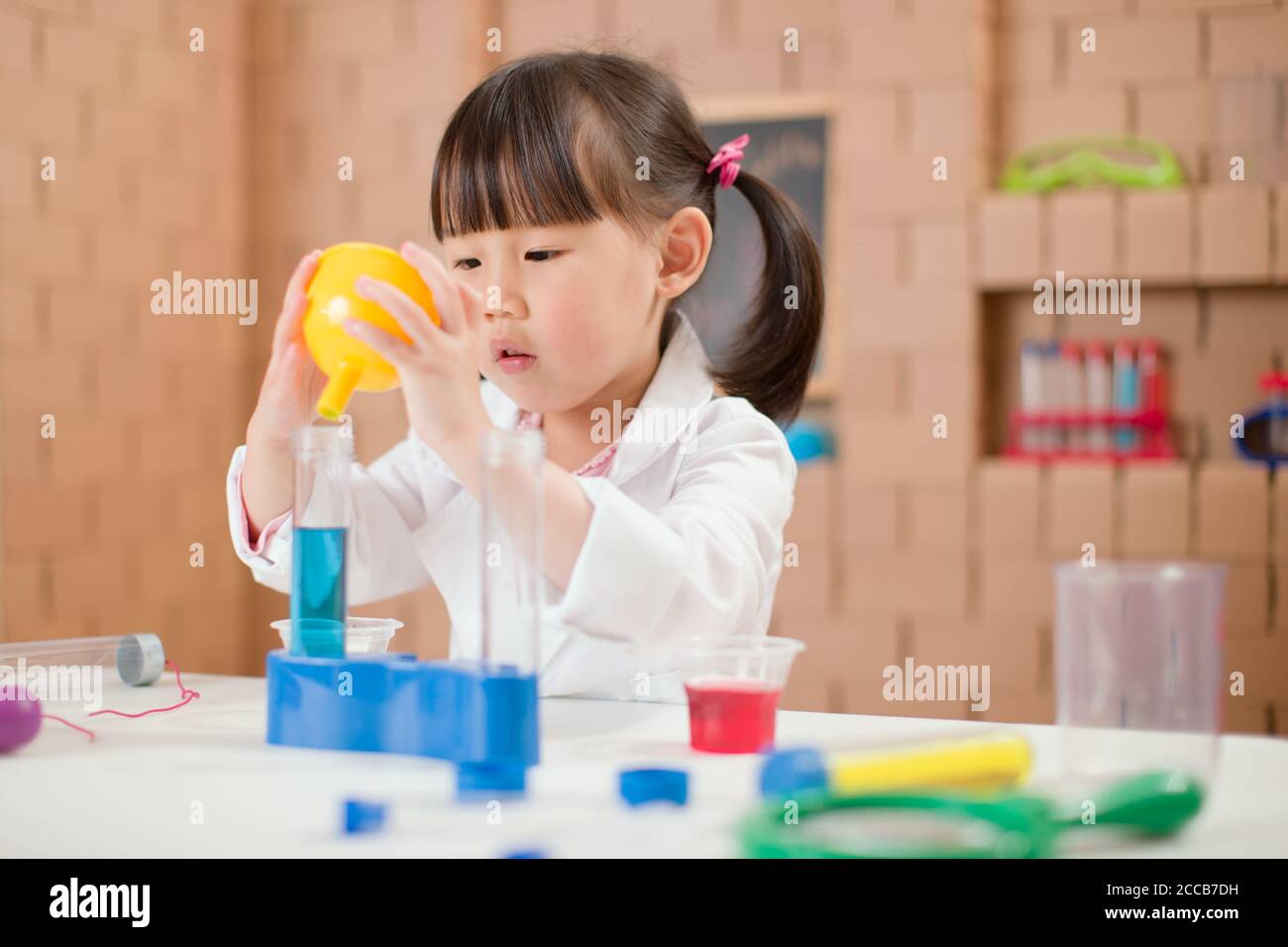 young girl play science experiments for homeschooling Stock Photo - Alamy