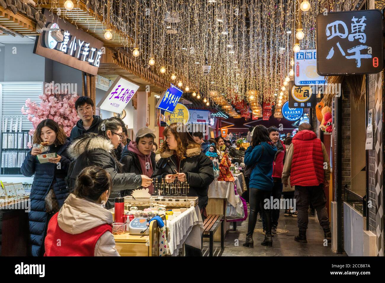 Indoor market with stalls and small shops in the Muslim Quarter at ...