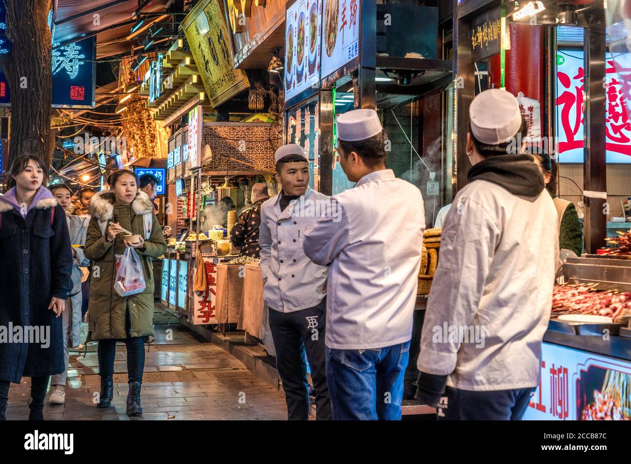 Night scene of food vendors and market stalls on the famous Muslim ...