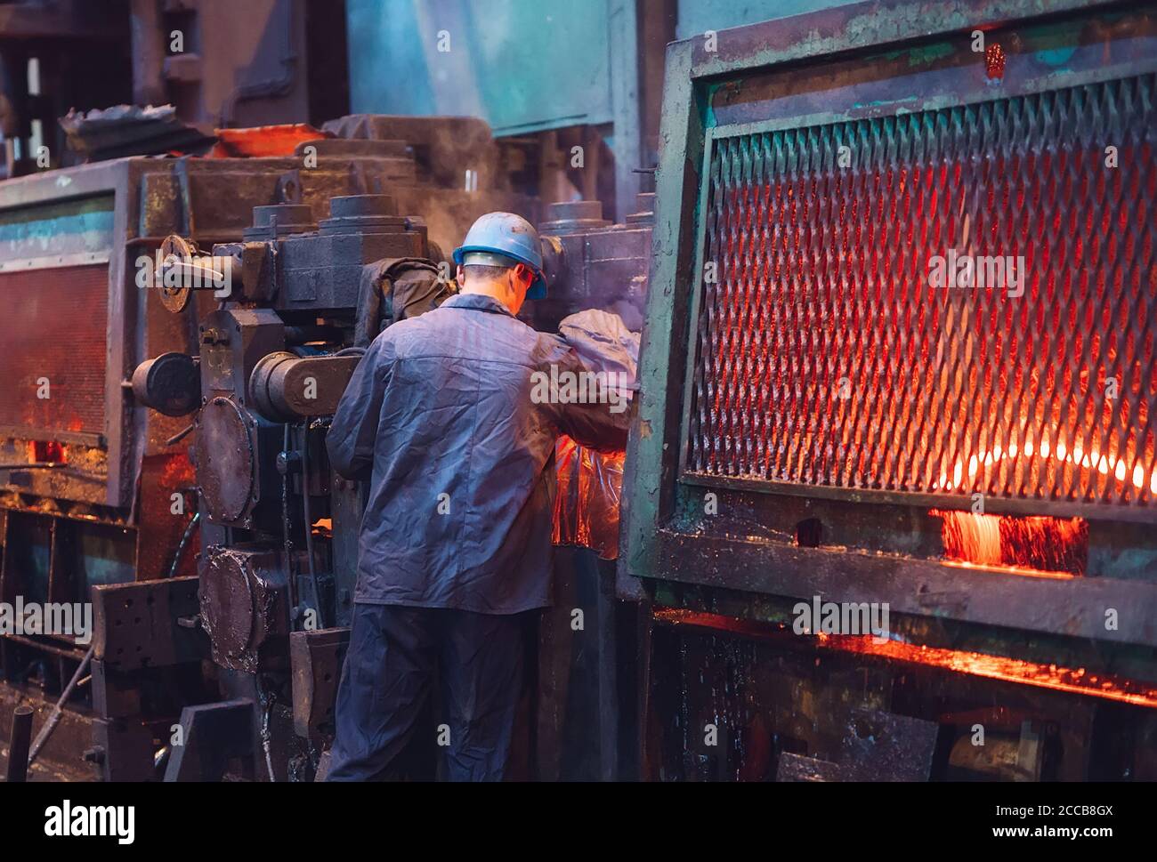 Workers in the steel mill. Industrial Environment Stock Photo - Alamy