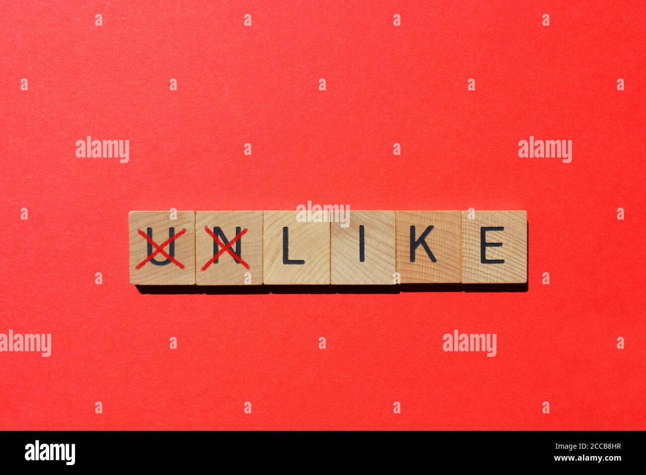 Unlike, word with the prefix Un crossed out, leaving the positive word ...