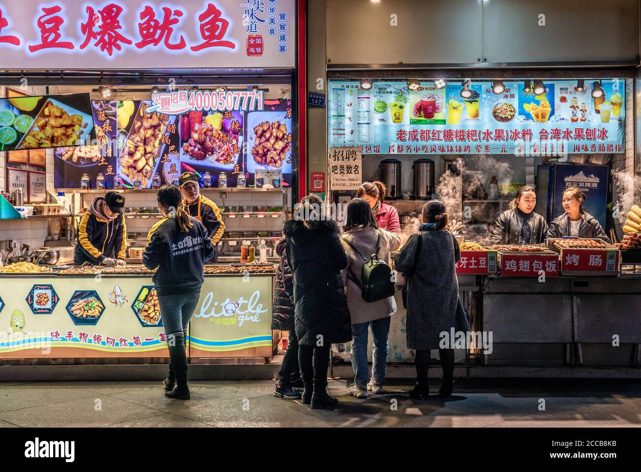 Night market food stalls at the Chunxi Road shopping district in ...