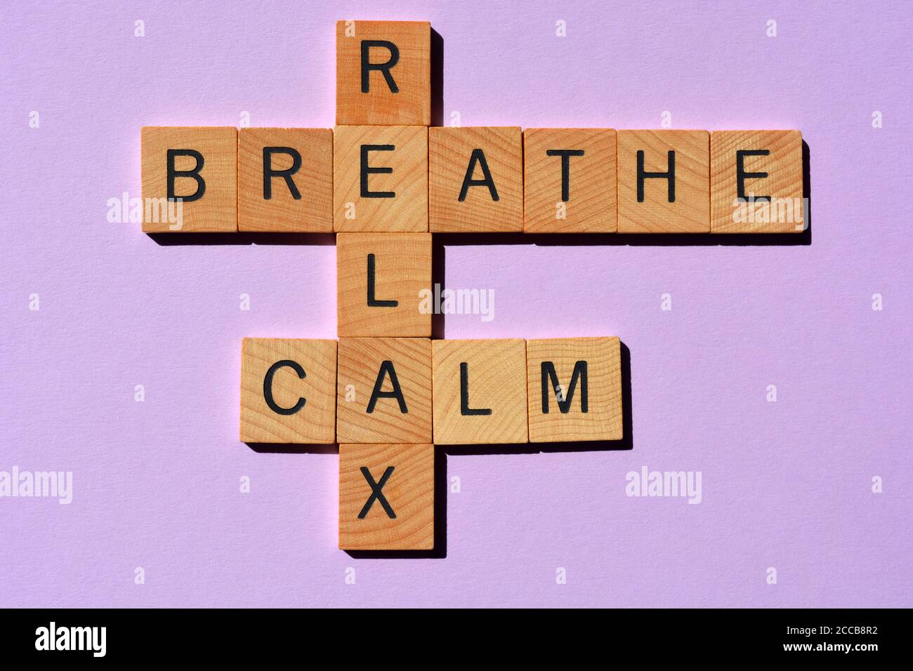 Breathe, Calm, Relax, words in wooden alphabet letters in crossword ...