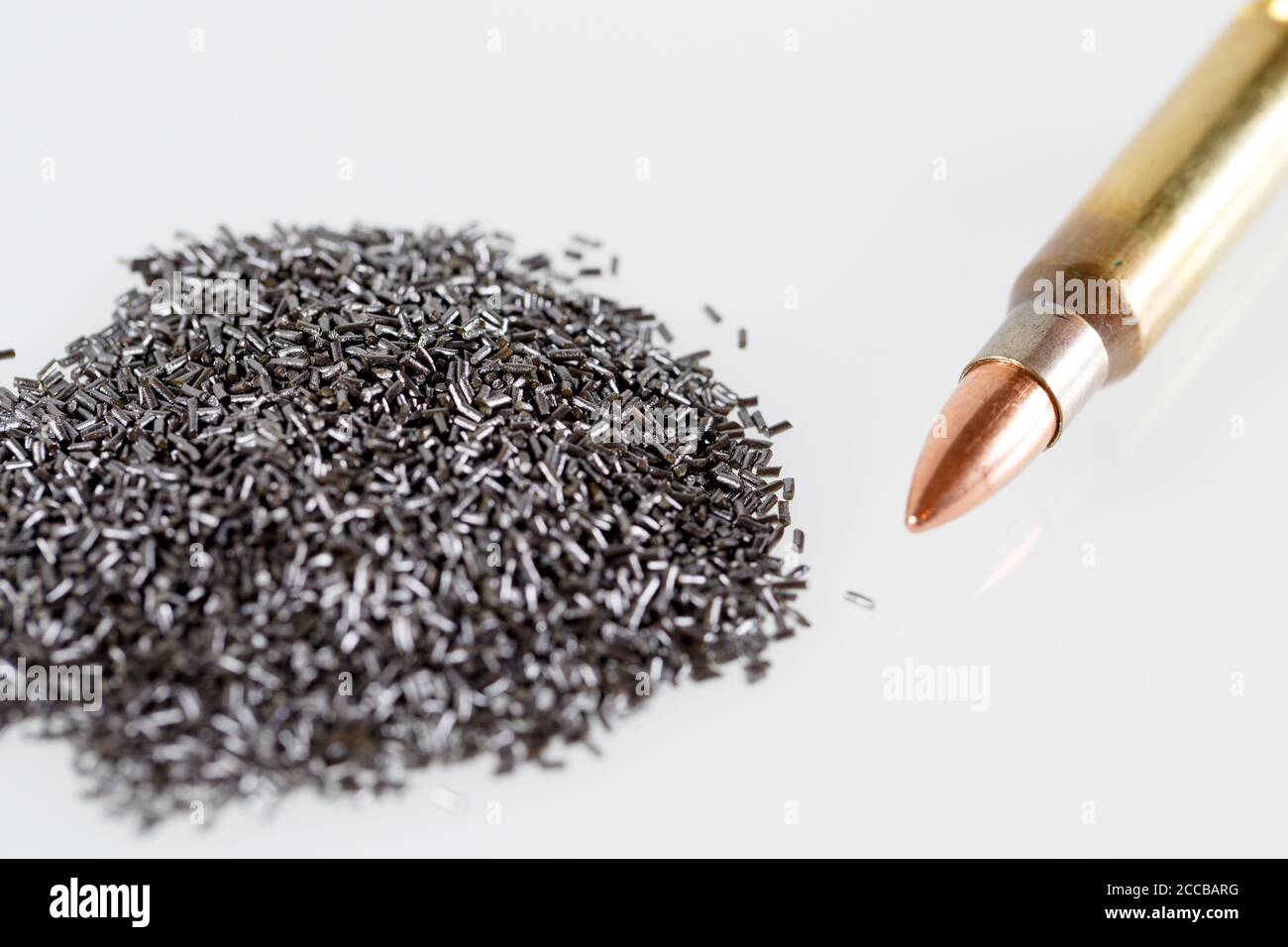 Gunpowder and Hunting cartridges caliber 308 Win on a white background ...