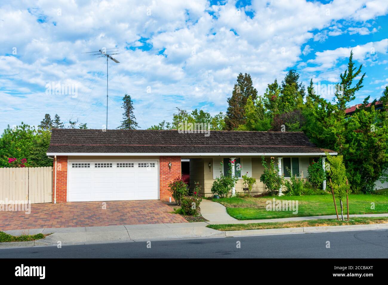 Exterior view of traditional ranch style single family detached home ...