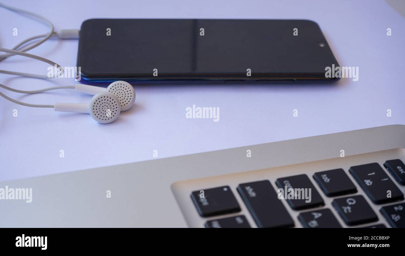 Close up the cell phone on the table Stock Photo - Alamy