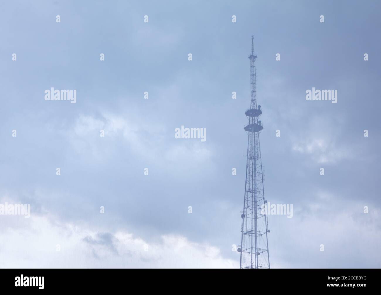 TV tower in the fog. Antenna for television Stock Photo - Alamy