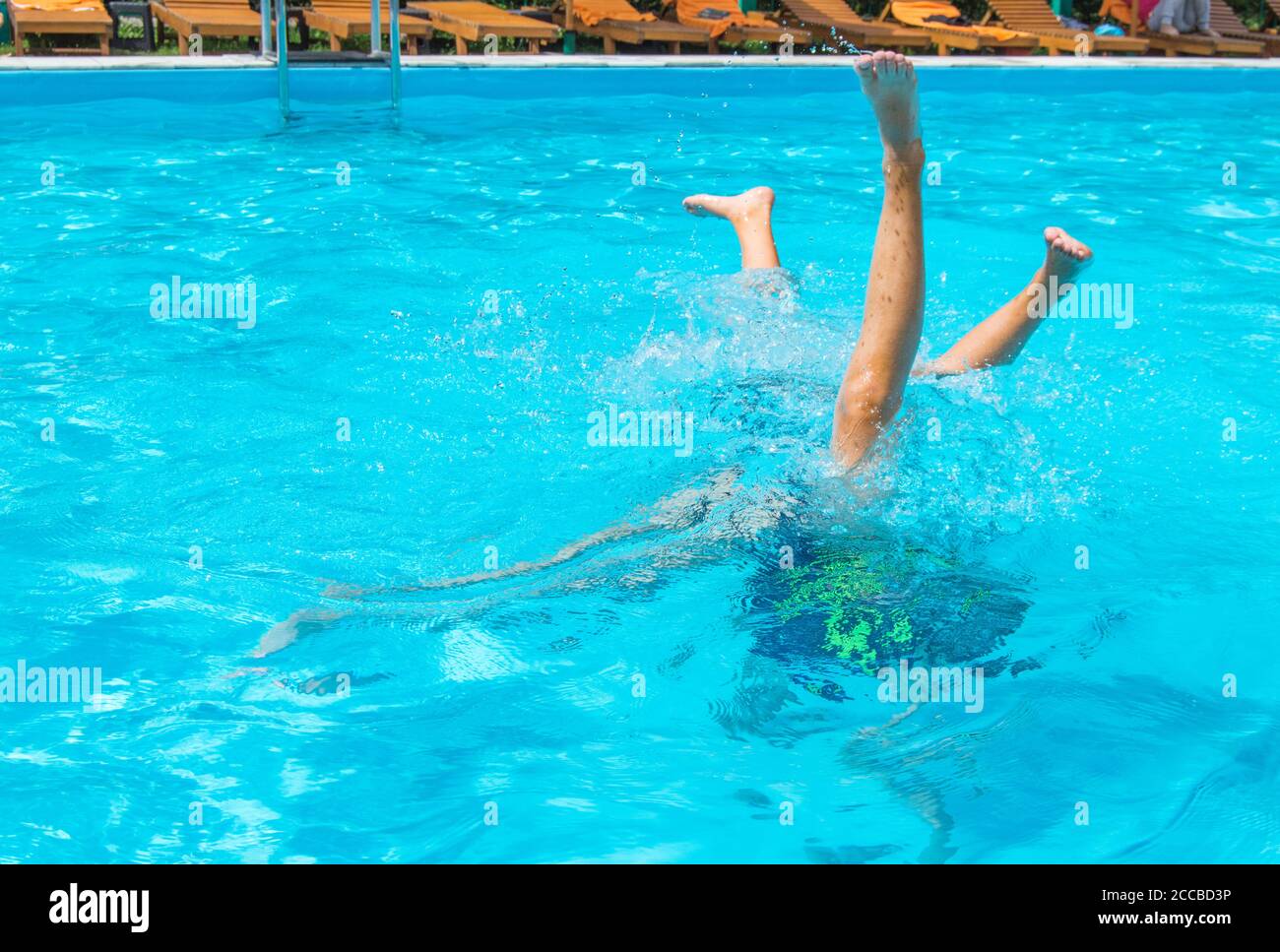 Barefoot child diving diving hi-res stock photography and images - Alamy