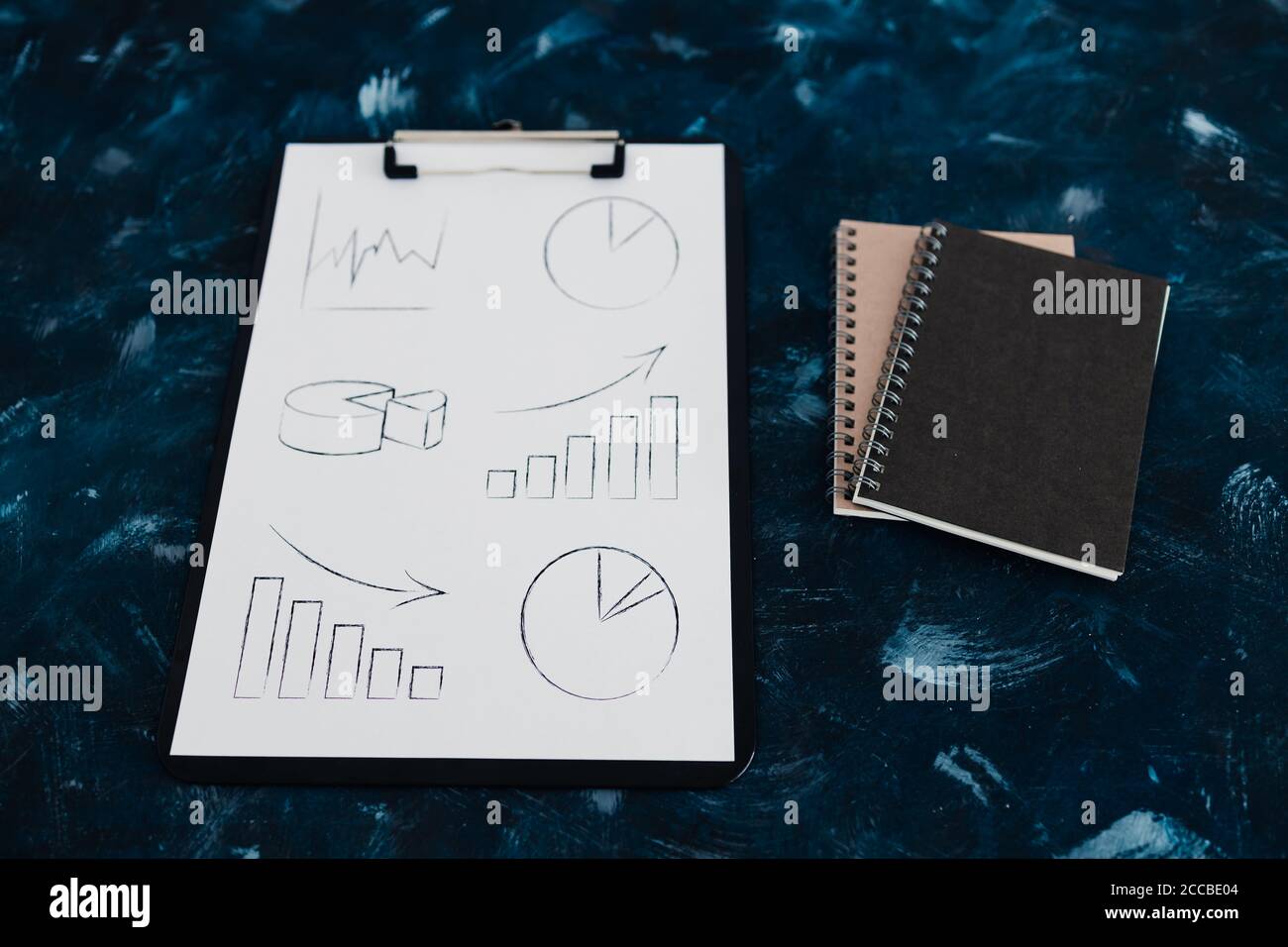 business analysis and statistics concept, desk with mixed graphs and ...