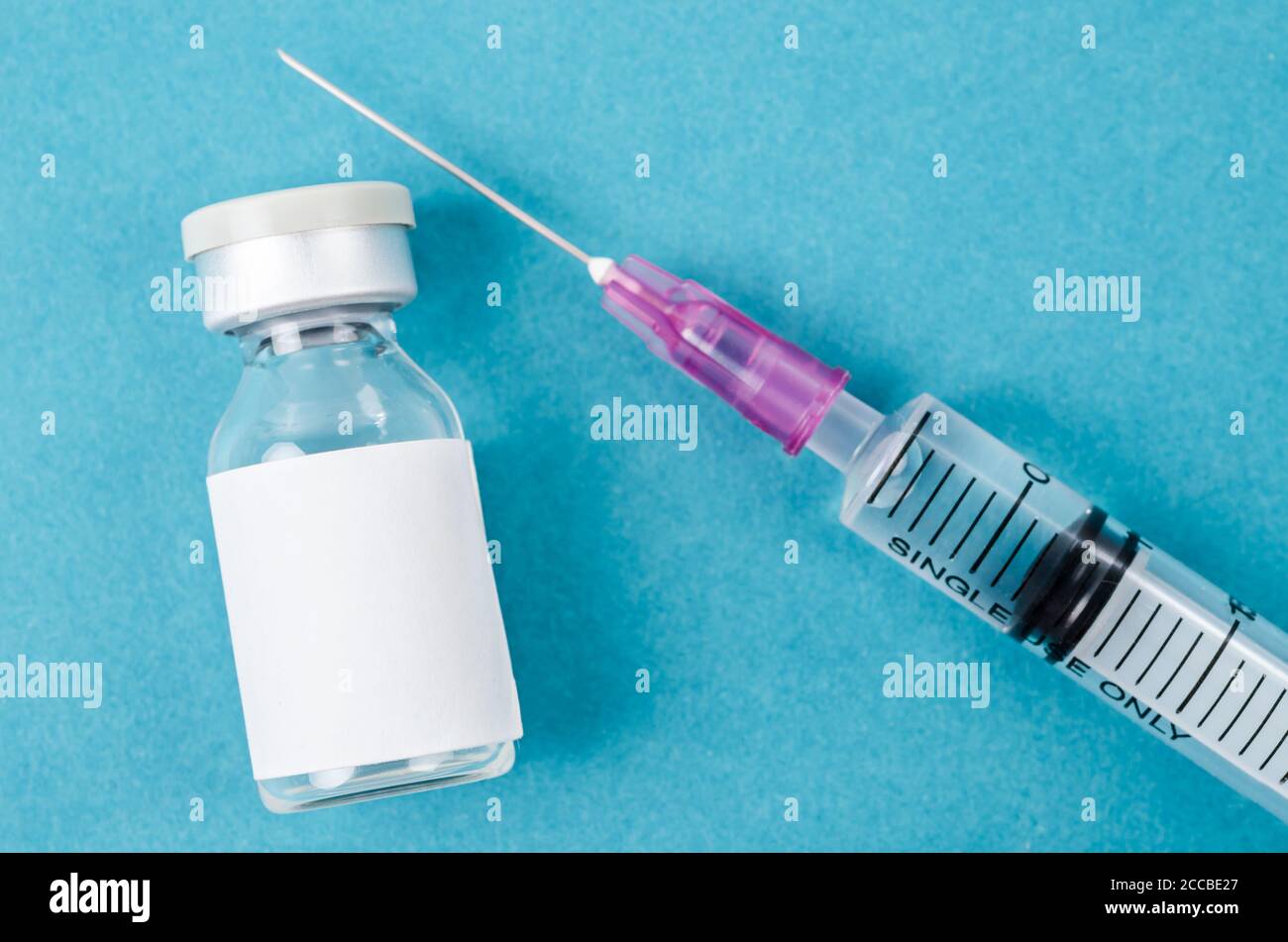 Vaccine vial dose with needle syringe, medical concept vaccination in ...