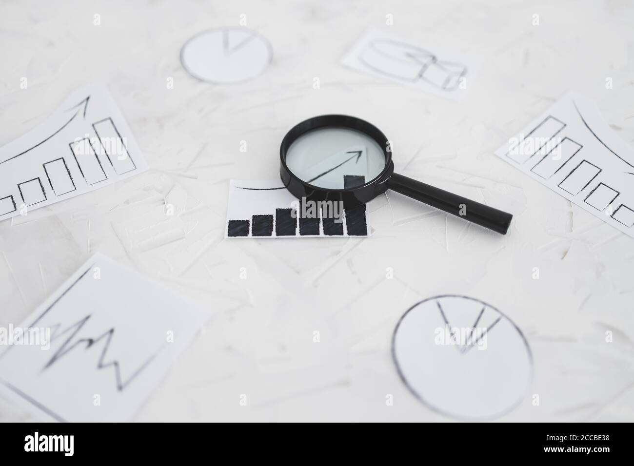 business analysis and statistics concept, desk with mixed graphs and ...