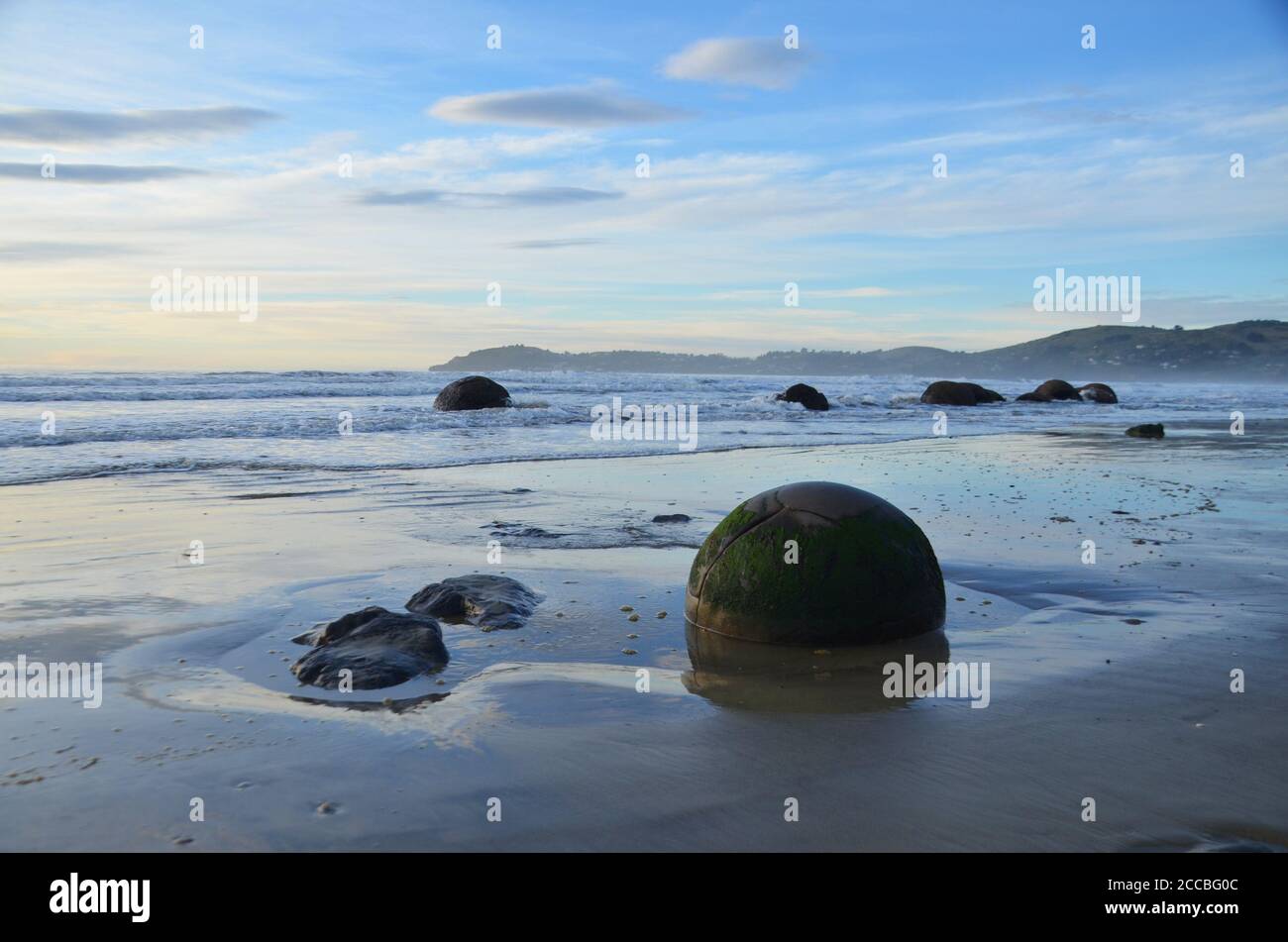 Boulders rock lying along coastline hi-res stock photography and images ...