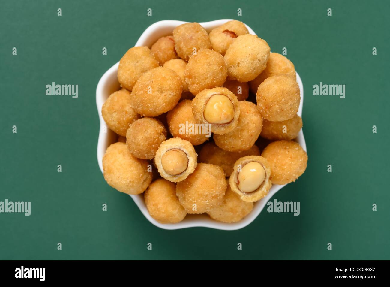 top view tasty peanuts snack on a small dish Stock Photo - Alamy