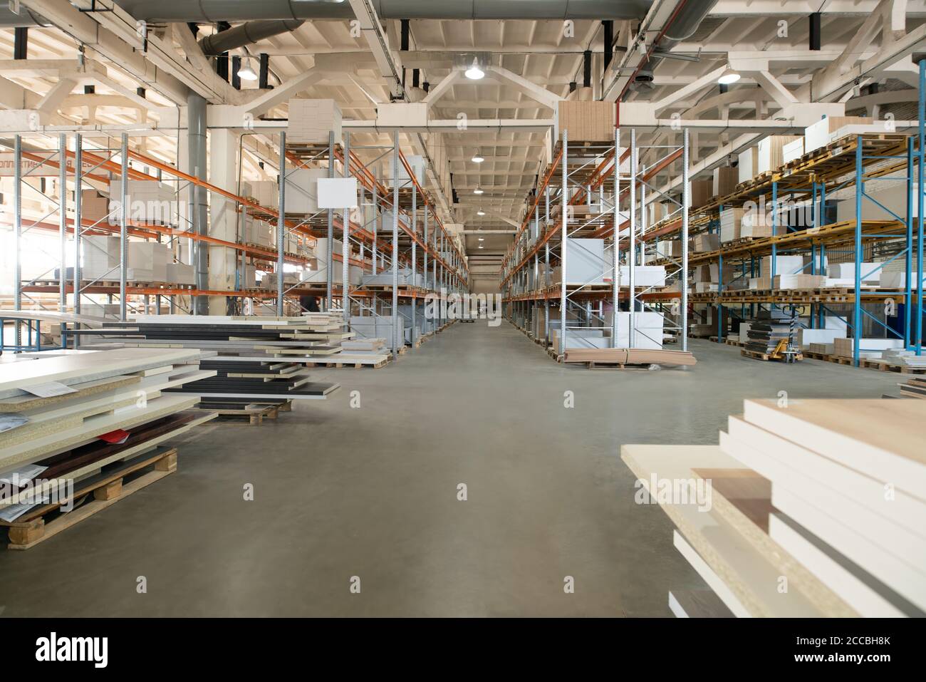 Nobody in huge storage warehouse interior on factory Stock Photo - Alamy
