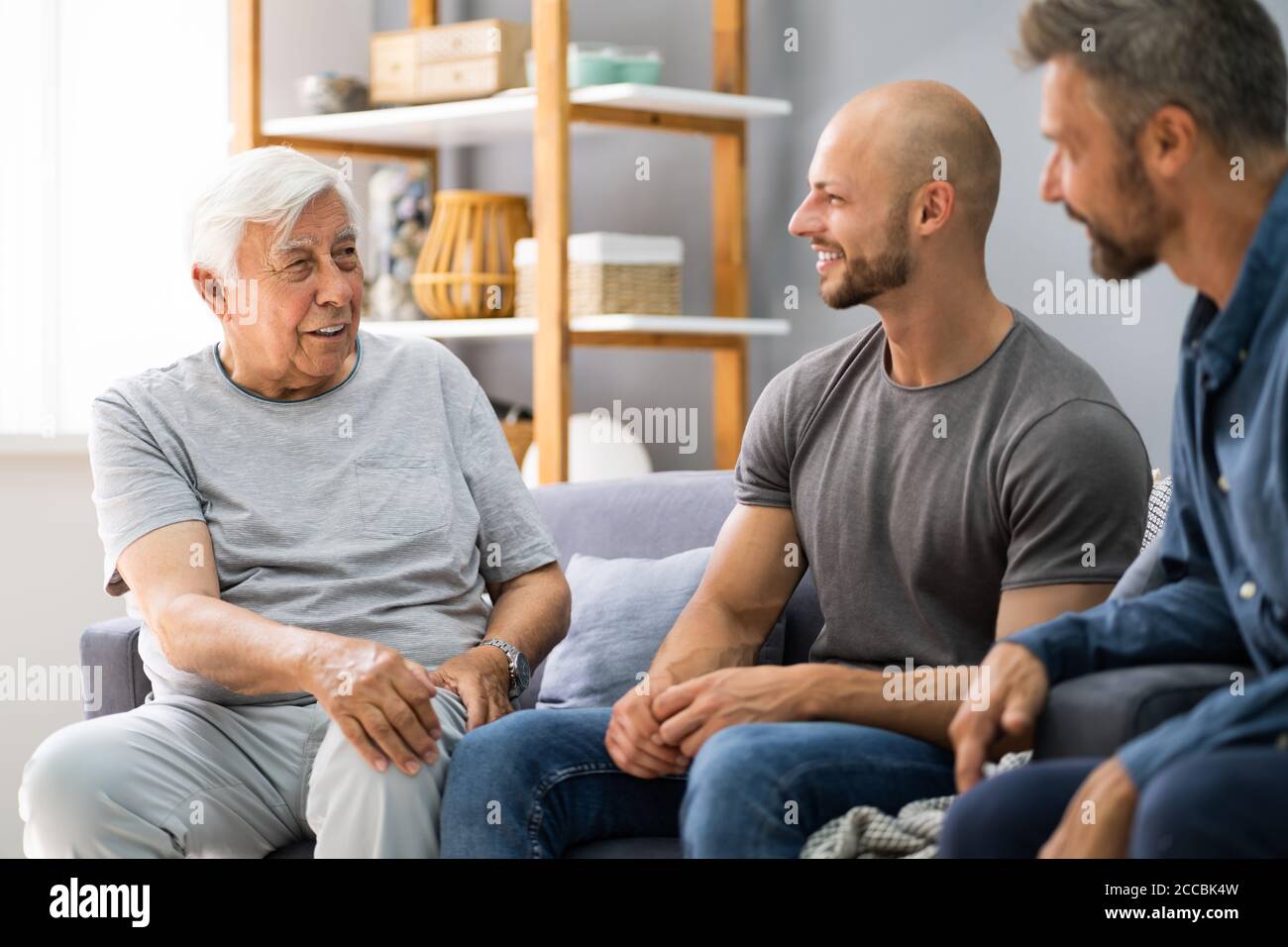 Three generations father son grandson hi-res stock photography and ...
