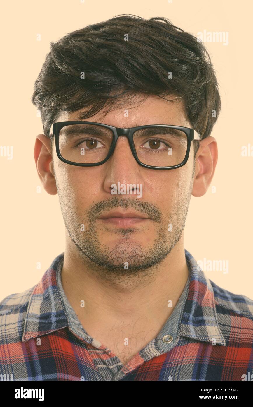 Face of young Persian man wearing eyeglasses Stock Photo - Alamy