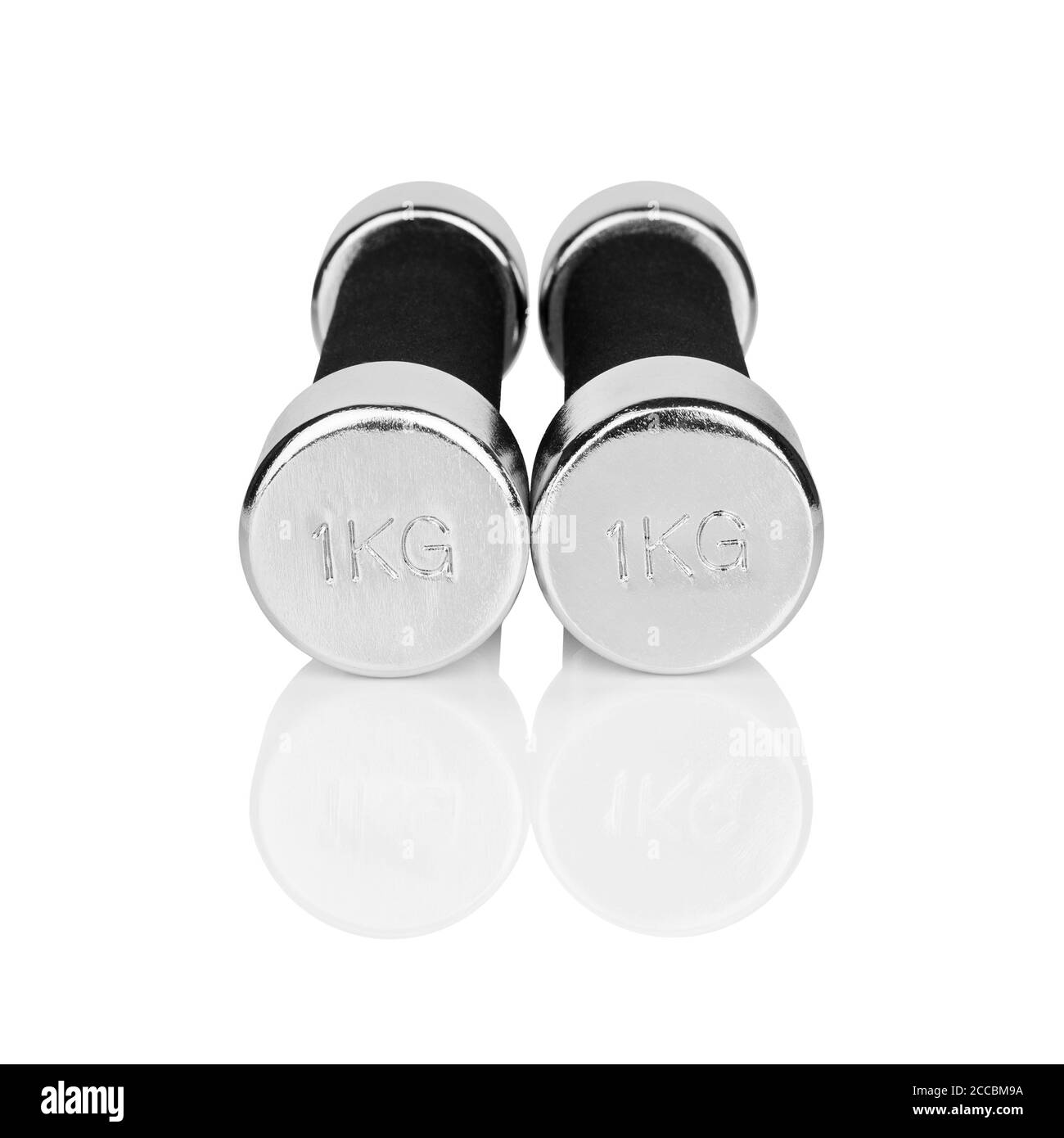 Two 1 kg dumbbells white background & reflection isolated close up ...