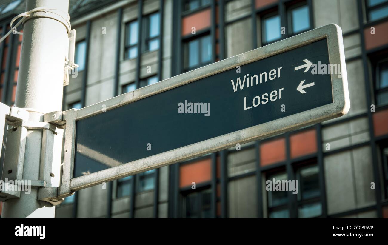 Street Sign the Direction Way to Winner versus Loser Stock Photo - Alamy