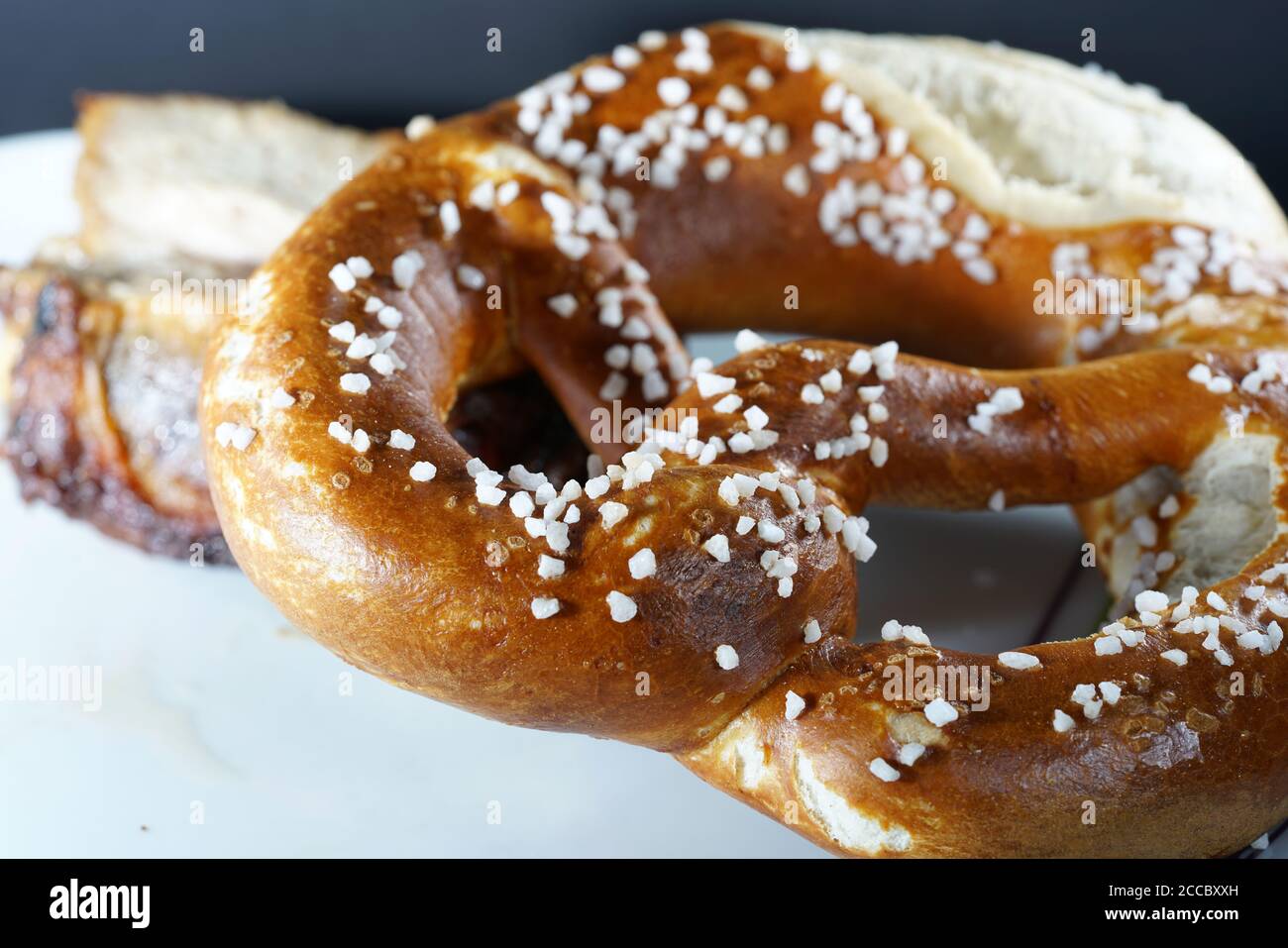 Pretzel, type of baked pastry made from dough, commonly shaped into a ...