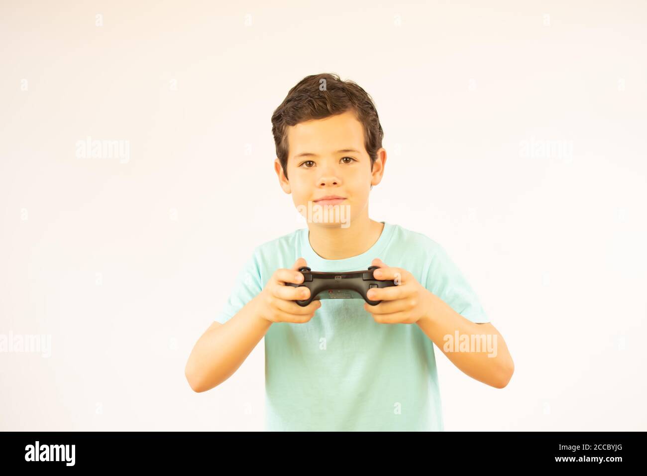 Boy playing racing console game hi-res stock photography and images - Alamy