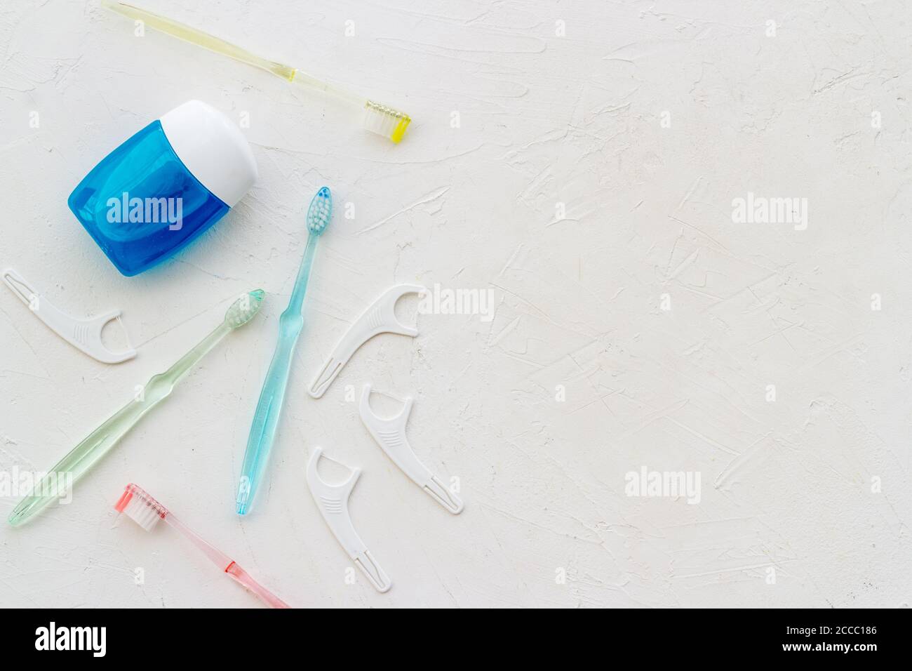 Set of different tools for dental care and hygiene. Top view, flat lay ...