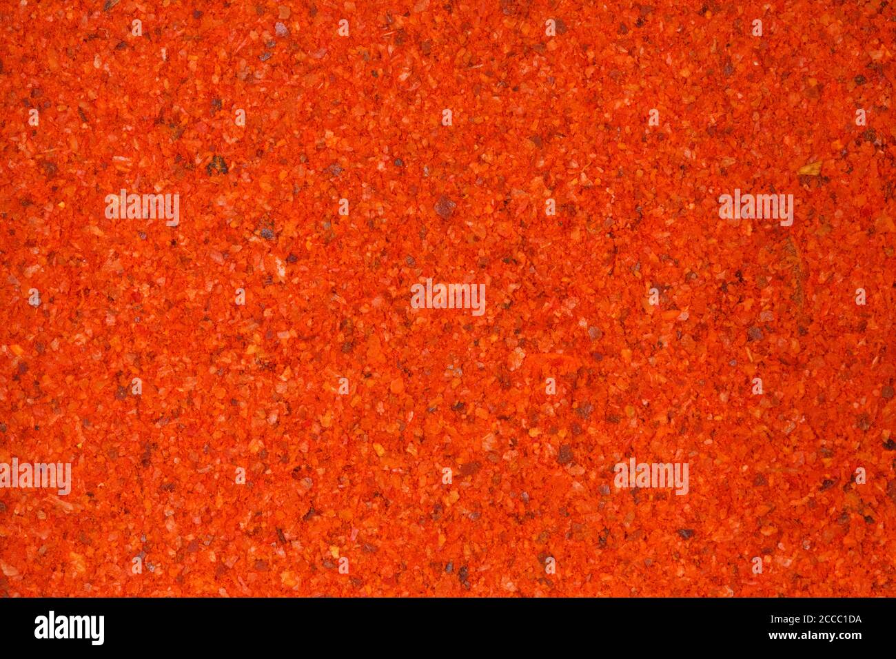 Red chili pepper in texture form close-up Stock Photo - Alamy