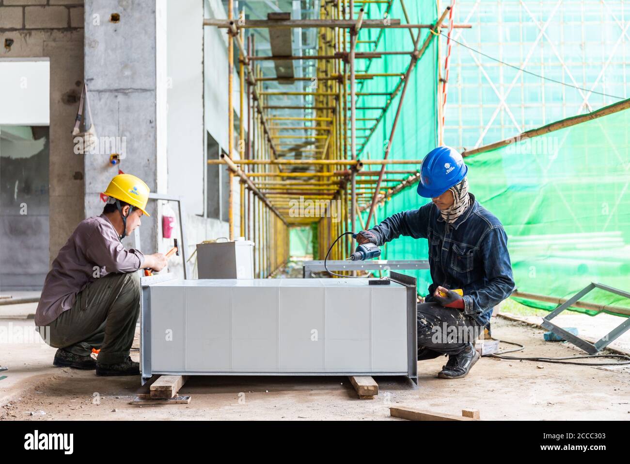 Vientiane, Laos. 13th Aug, 2020. Workers are seen at the construction ...