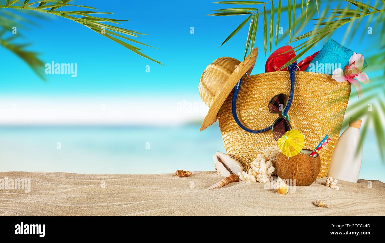 Tropical beach with sunbathing accessories, summer holiday background ...