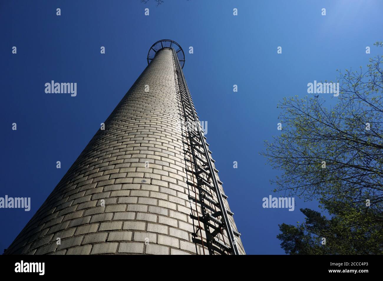Low angle shot of a brick-lined chimney from an old heating plant Stock ...