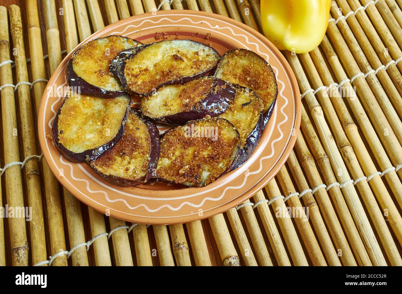 Bengali Begun Bhaja - vegetarian recipe of shallow-fried eggplant disks ...