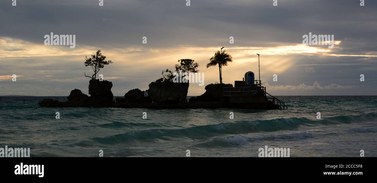 Sunbeams on Willy Rock. Boracay island. Western Visayas. Philippines ...