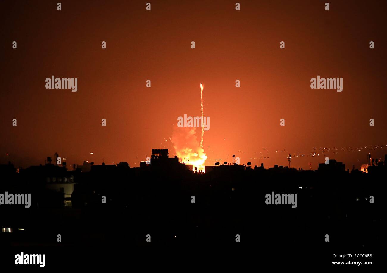 Gaza City, The Gaza Strip, Palestine. 21st Aug, 2020. Flares light the ...