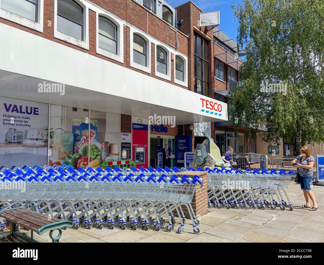 Tesco supermarket exterior during covid 19 restrictions egham su hi-res ...