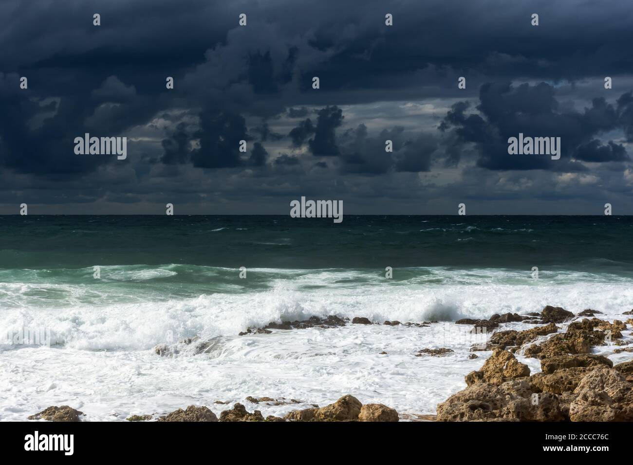 A violent storm in the sea. Beautiful blue storm clouds. A cloudy ...