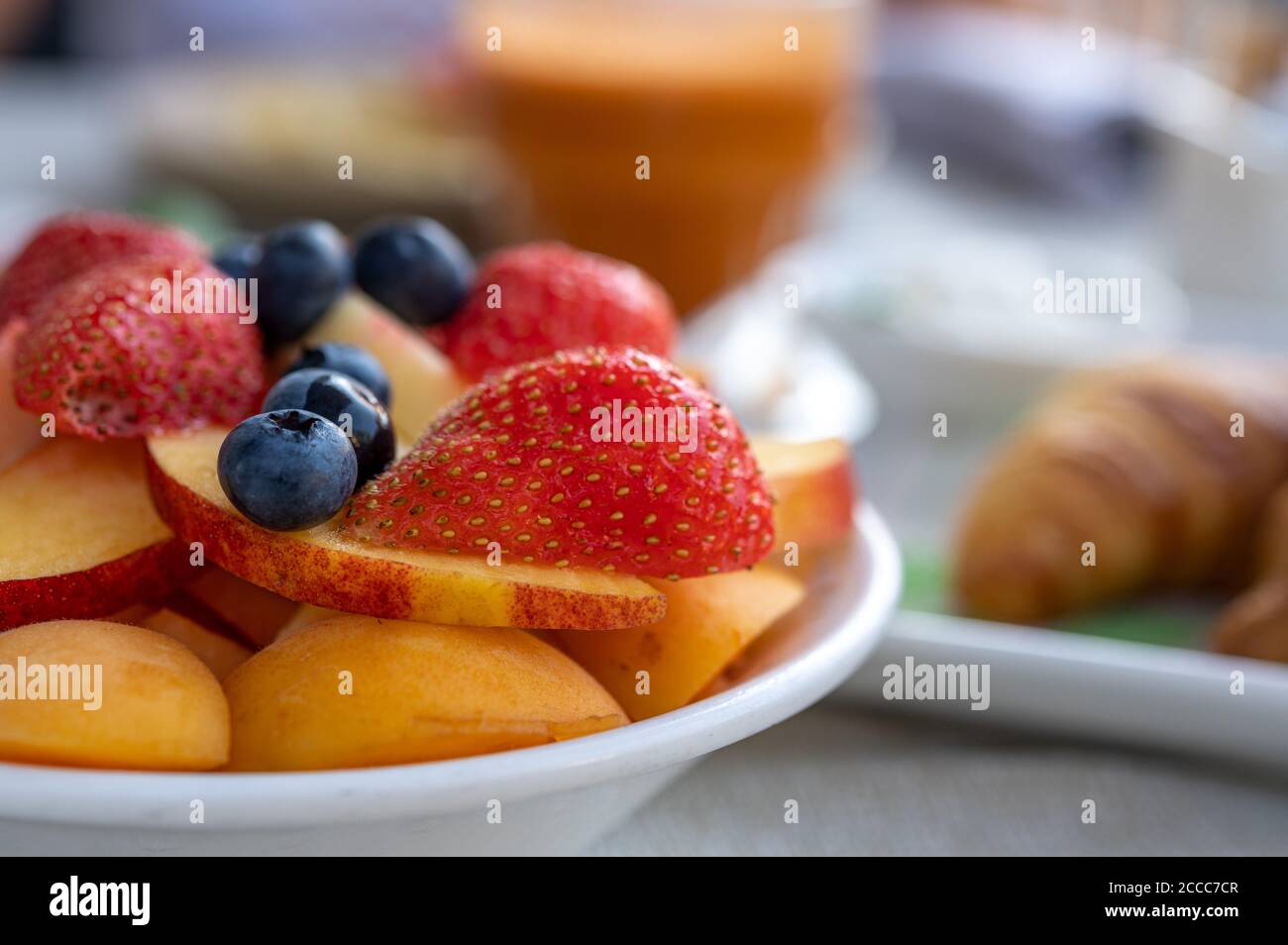 Various kind of fruits for breakfast Stock Photo - Alamy