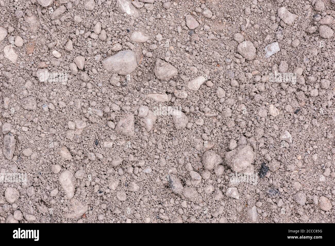 Sand and small stones Stock Photo - Alamy