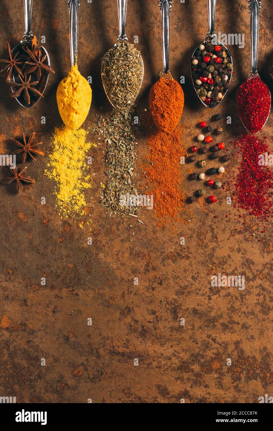 The Different Spices. Spices on stone background Stock Photo - Alamy