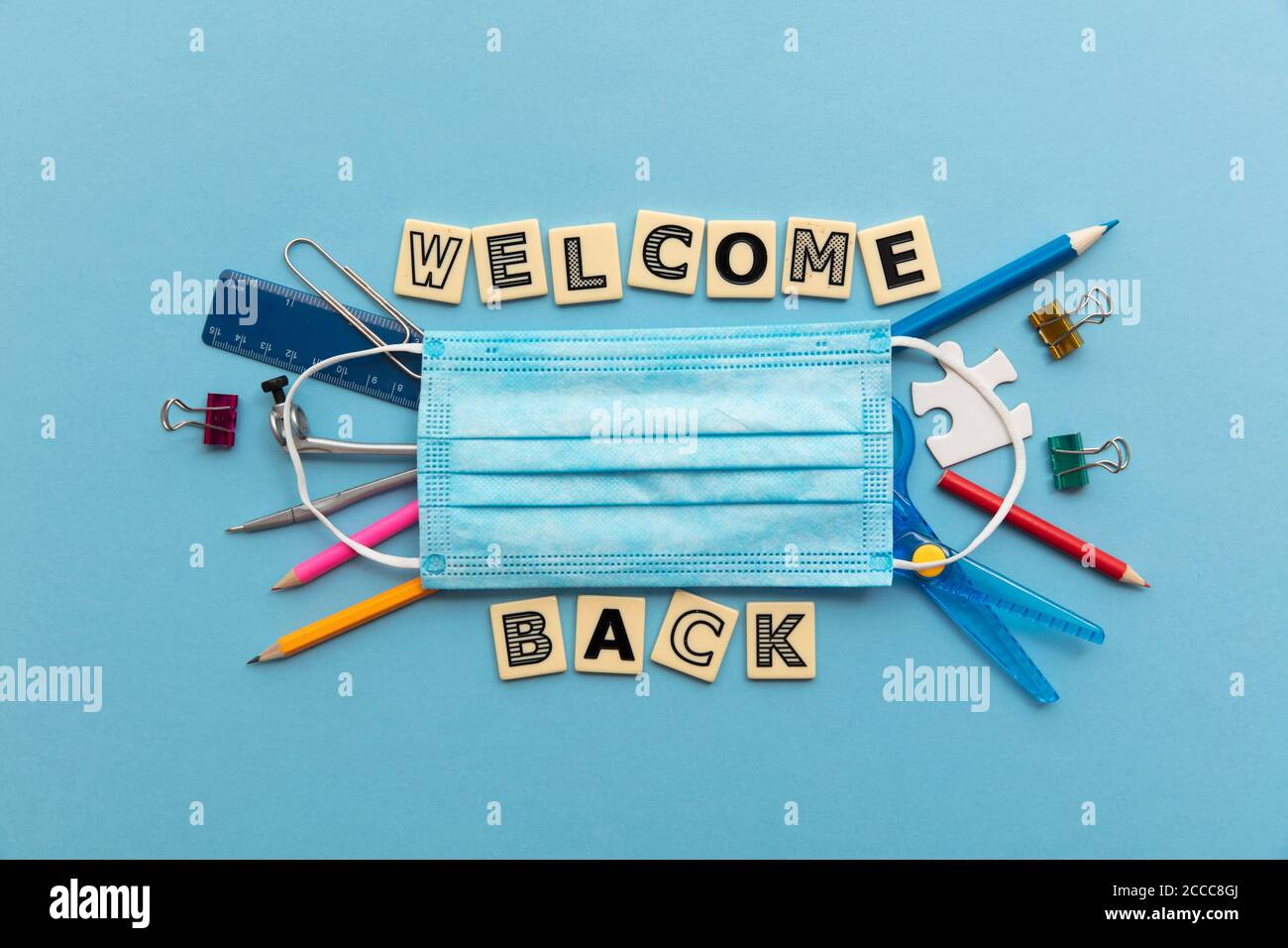 Welcome back to school concept. School supplies with a face mask Stock ...