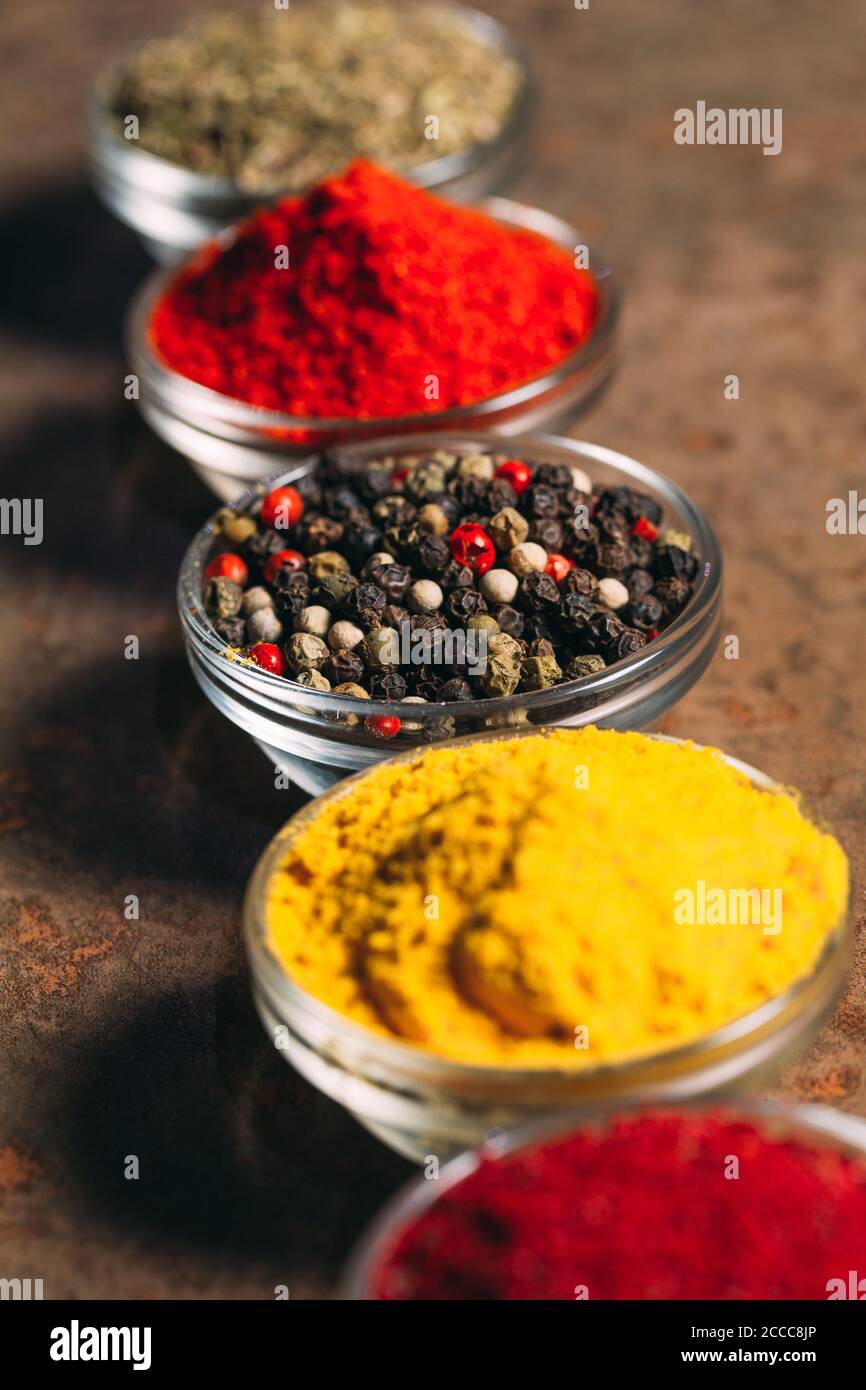 The Different Spices. Spices on stone background Stock Photo - Alamy