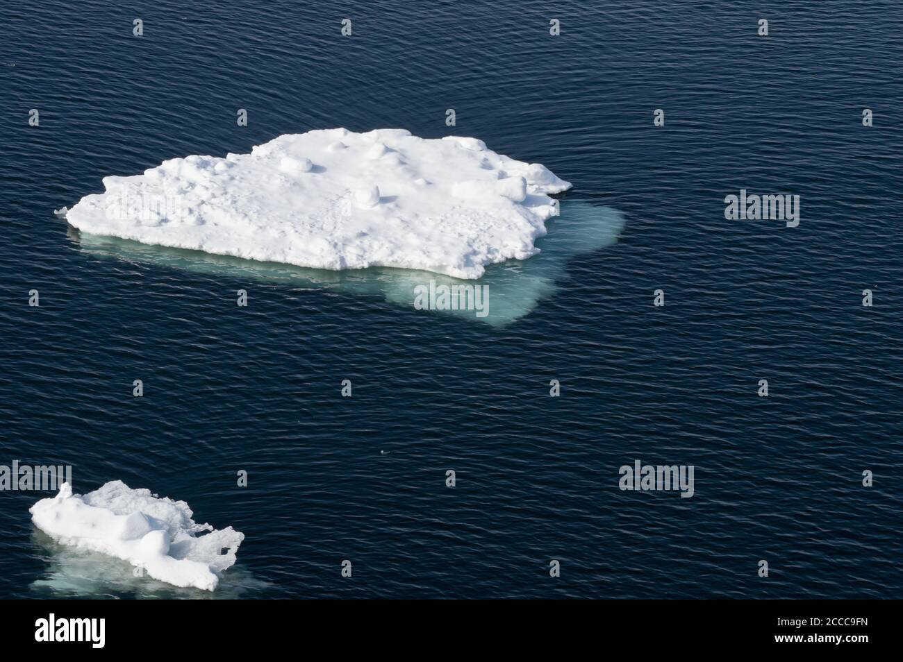High angle shot of ice floes in the ocean Stock Photo - Alamy