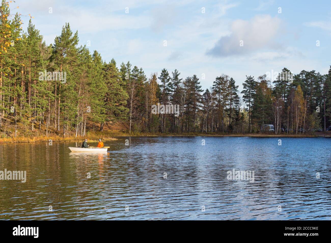 Man fishing in lake edge hi-res stock photography and images - Alamy