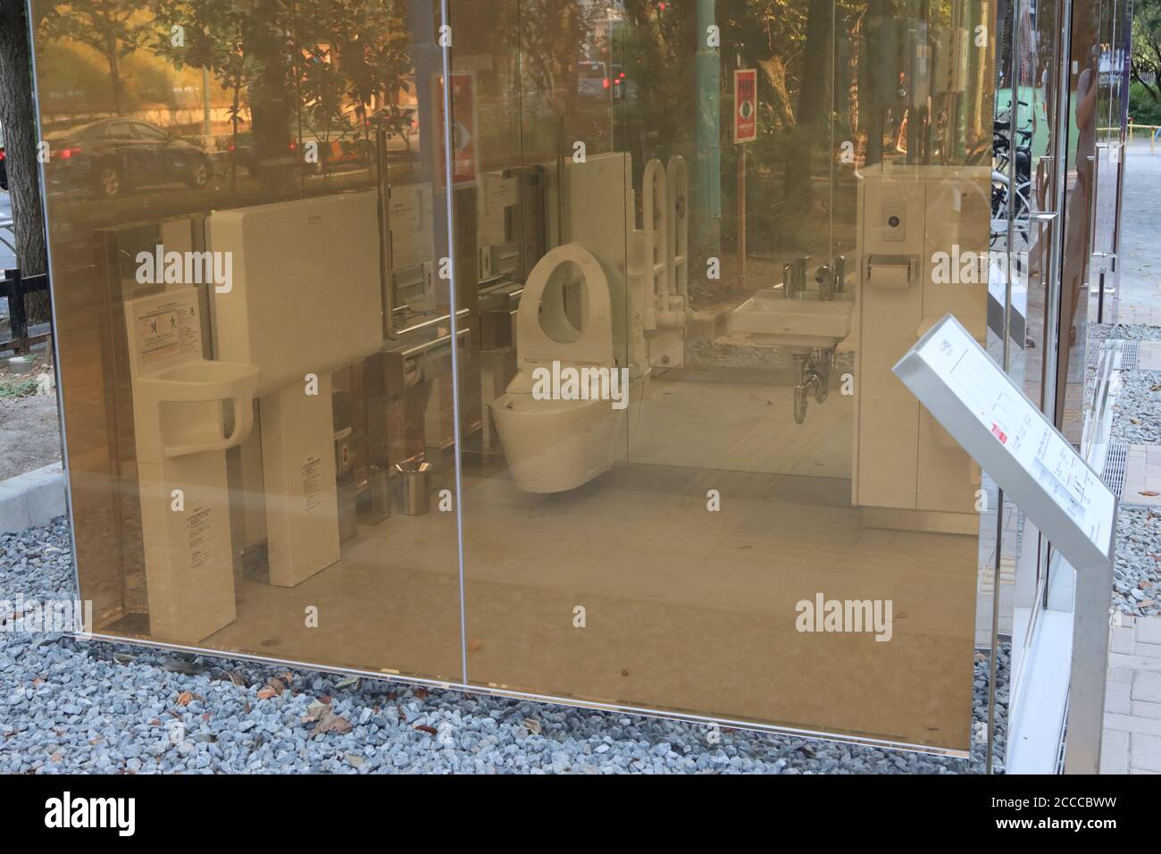 A general view of a transparent public toilet designed by Shigeru Ban ...