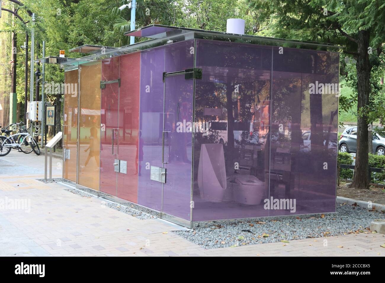 A general view of a transparent public toilet designed by Shigeru Ban ...