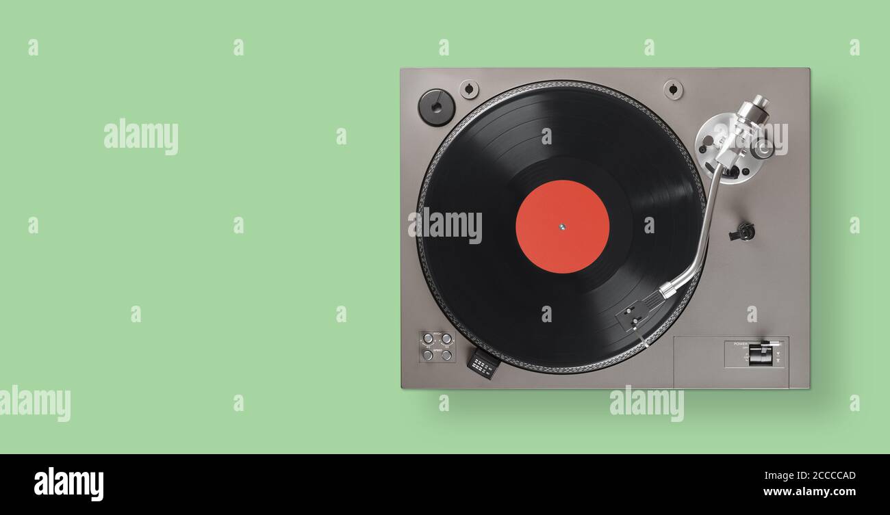 Turntable is playing vinyl LP record top view. Clipping path Stock ...