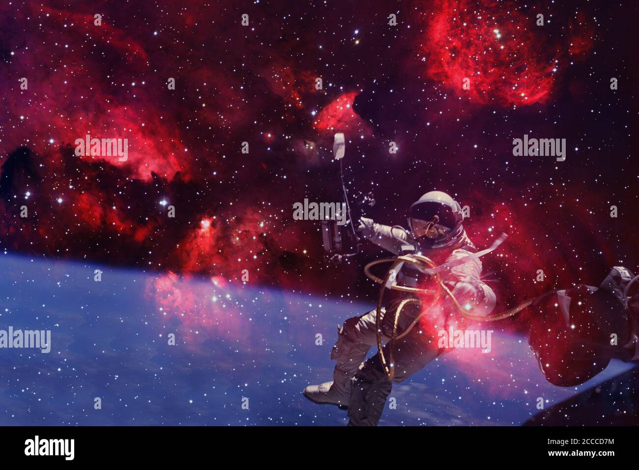 Astronaut. Nebula, cluster of stars in deep space. Science fiction art. Elements of this image ...