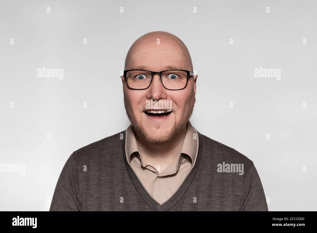 Emotional male face - delight man Stock Photo - Alamy