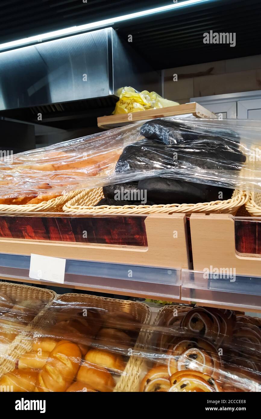 Fresh baked goods on a store shelf Stock Photo - Alamy
