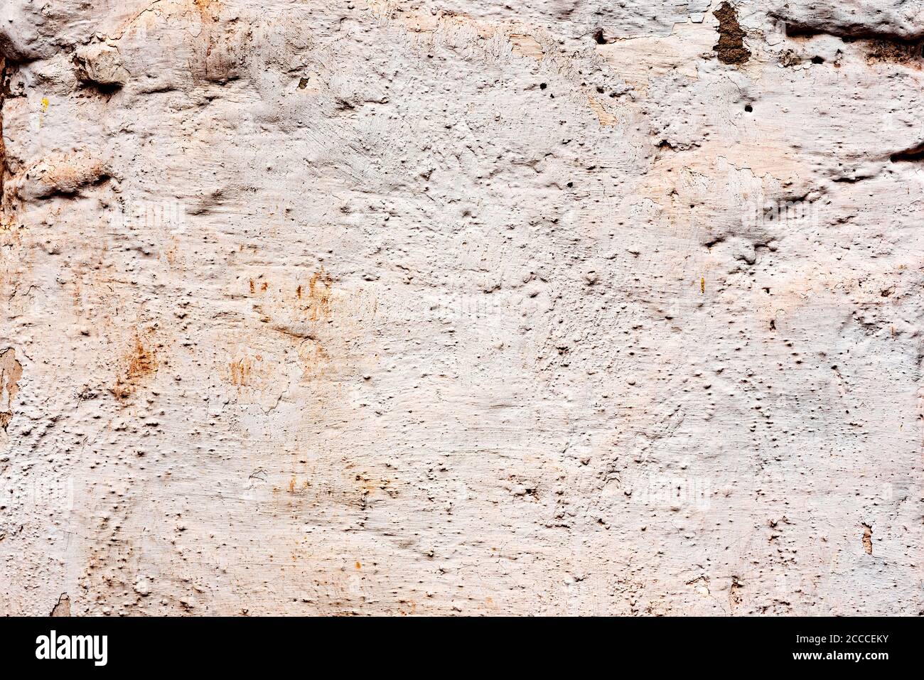 Cream concreted wall for interiors or outdoor exposed surface polished ...