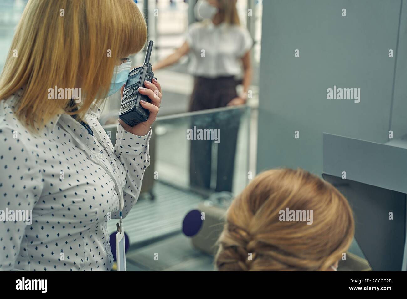 Woman working ticket desk hi-res stock photography and images - Alamy